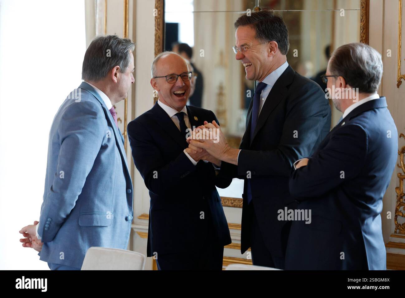 NATO Secretary General Mark Rutte, second right, speaks with, from left ...