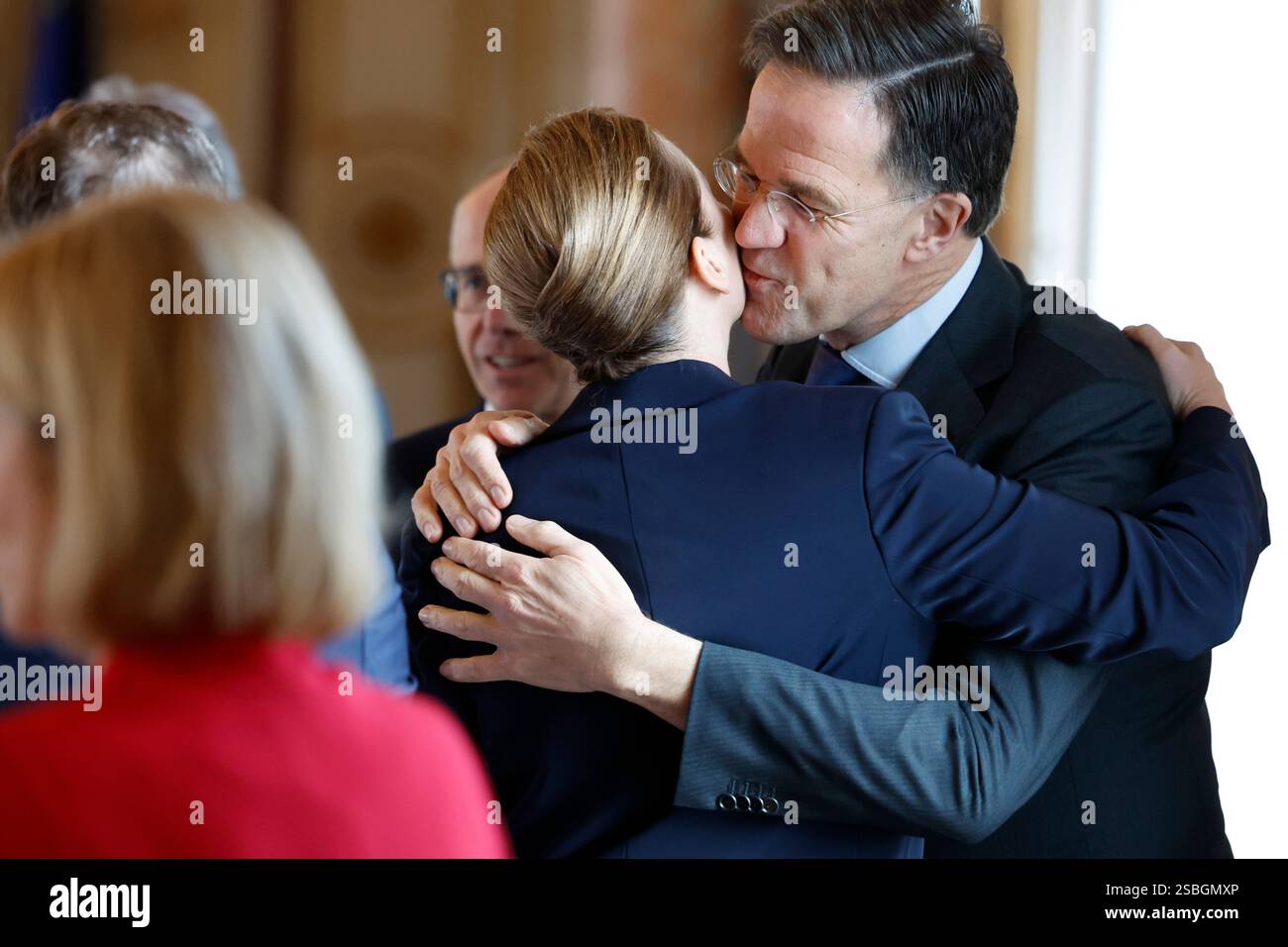 NATO Secretary General Mark Rutte, right, greets Denmark's Prime Minister Mette Frederiksen ...