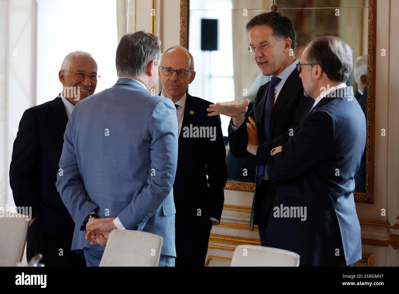 NATO Secretary General Mark Rutte, second right, speaks with, from left ...