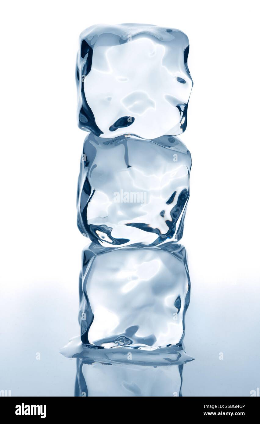 Melted ice cubes on white background Stock Photo - Alamy