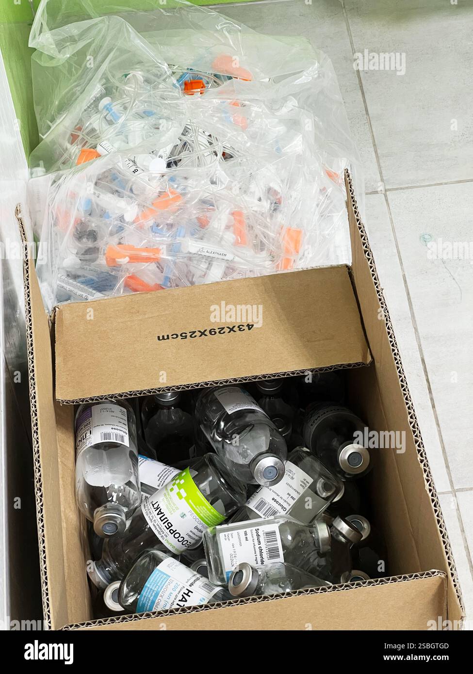 Kyiv, Ukraine - February 02, 2025: A collection of used syringes and ...