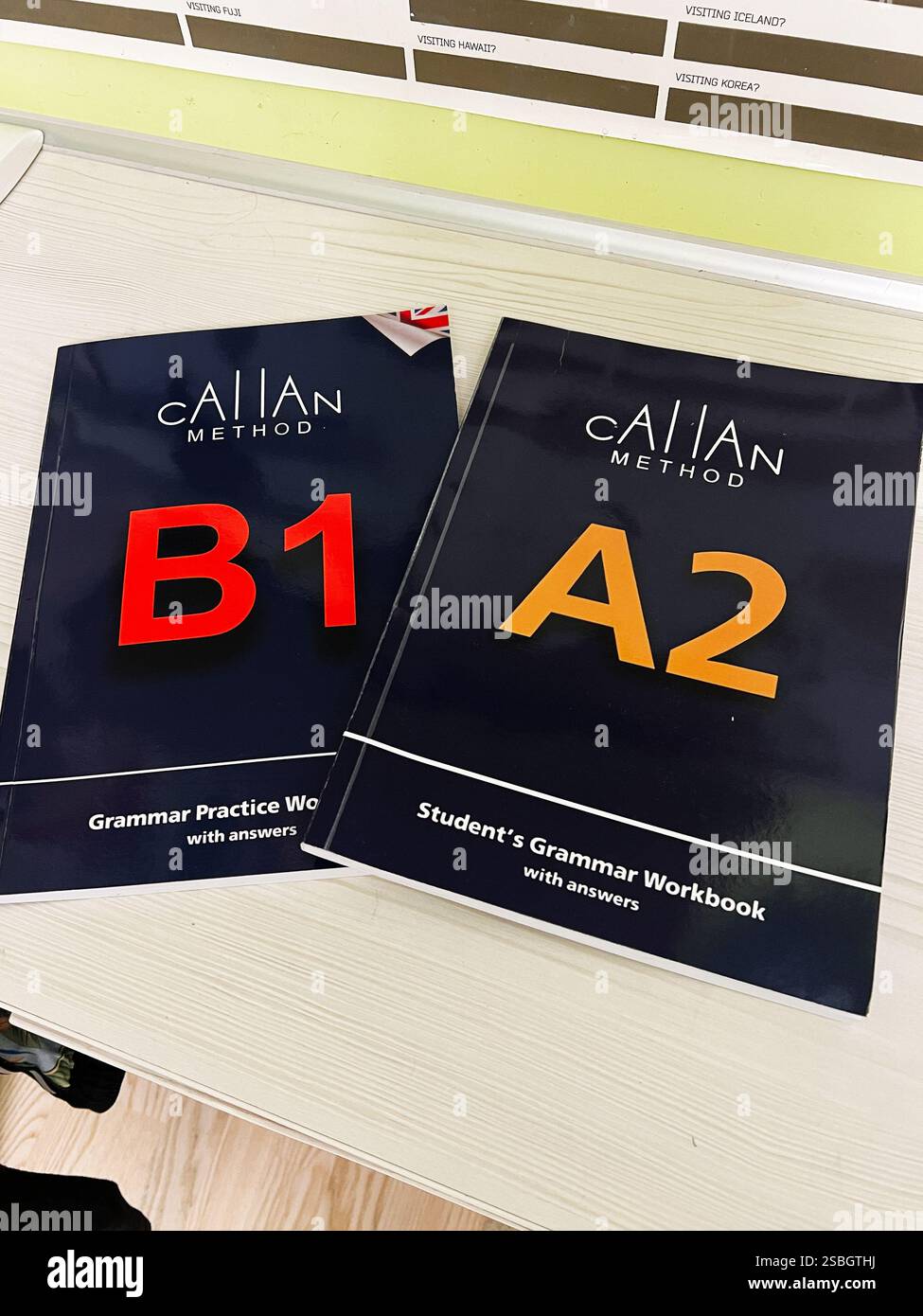 Kyiv, Ukraine - February 02, 2025: Two Callan Method grammar workbooks, labeled B1 and A2 ...
