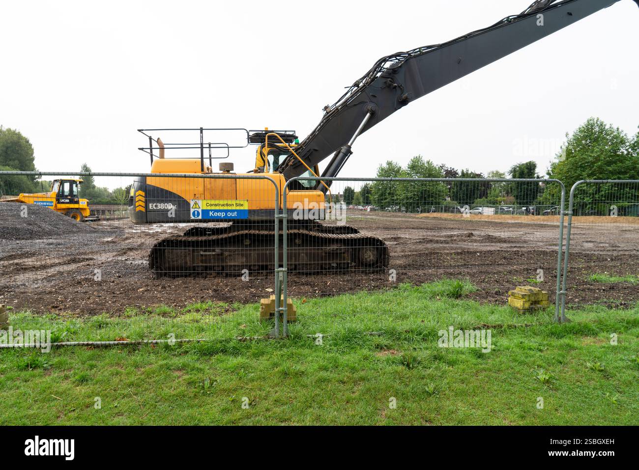 Earth moving machinery on a construction site Stock Photo - Alamy