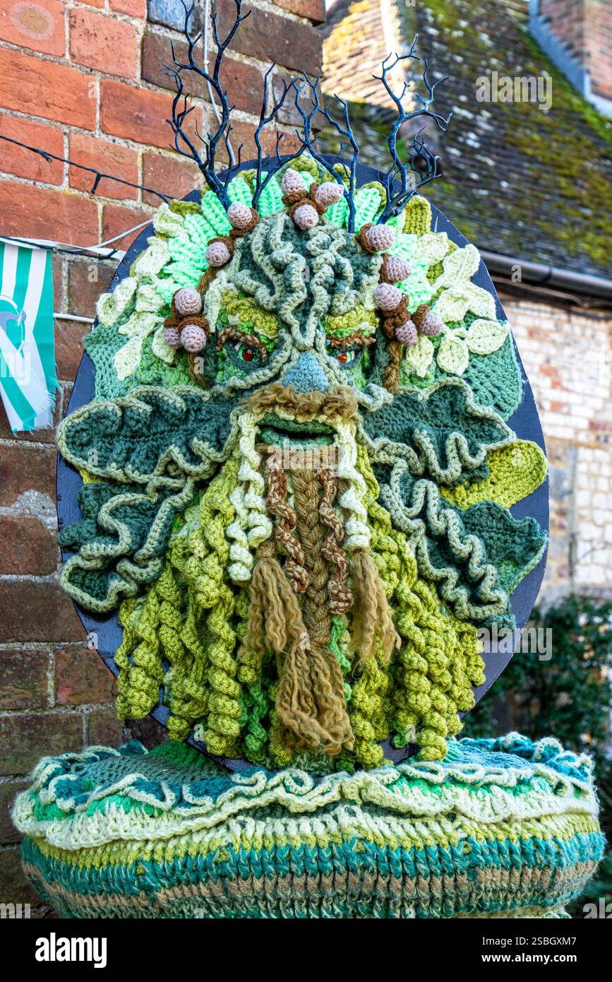 Wool knitted green man face Stock Photo - Alamy