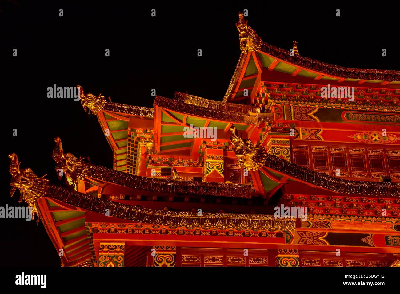 Hipped roof on Tibetan Buddhist Dafo Temple in Guishan Park at night in ...