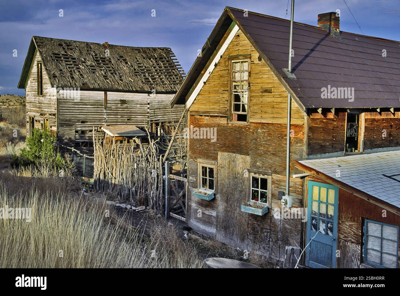 Old miners cabins before renovation in village of Madrid, in winter ...