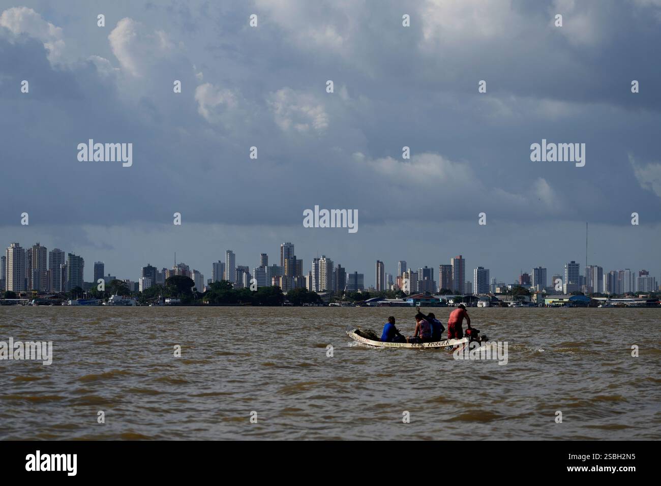 FILE - A boat sails on the bay of the Guama River with Belem, Brazil ...