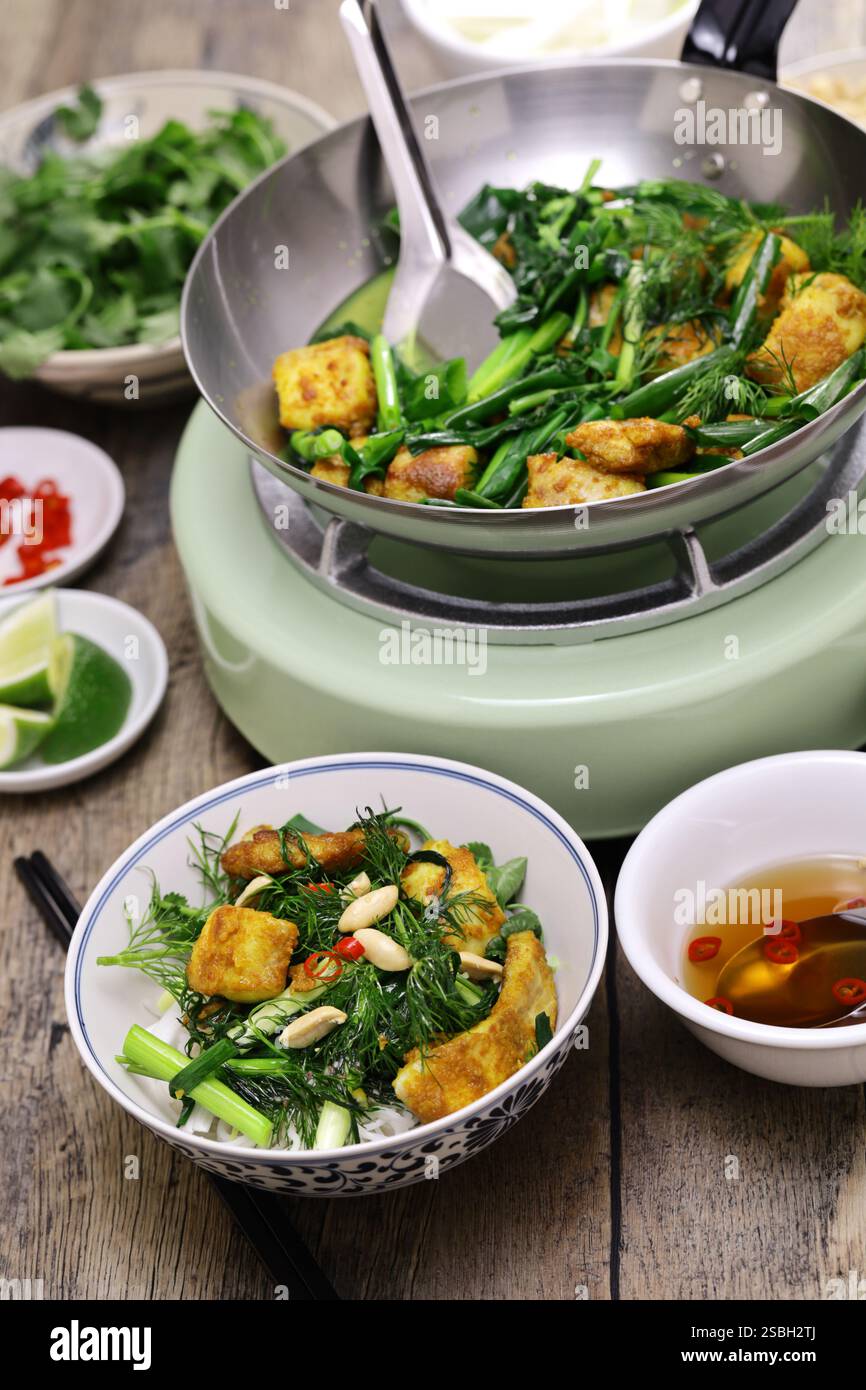 Cha Ca La Vong, a specialty dish from Hanoi, Vietnam. Marinated river ...