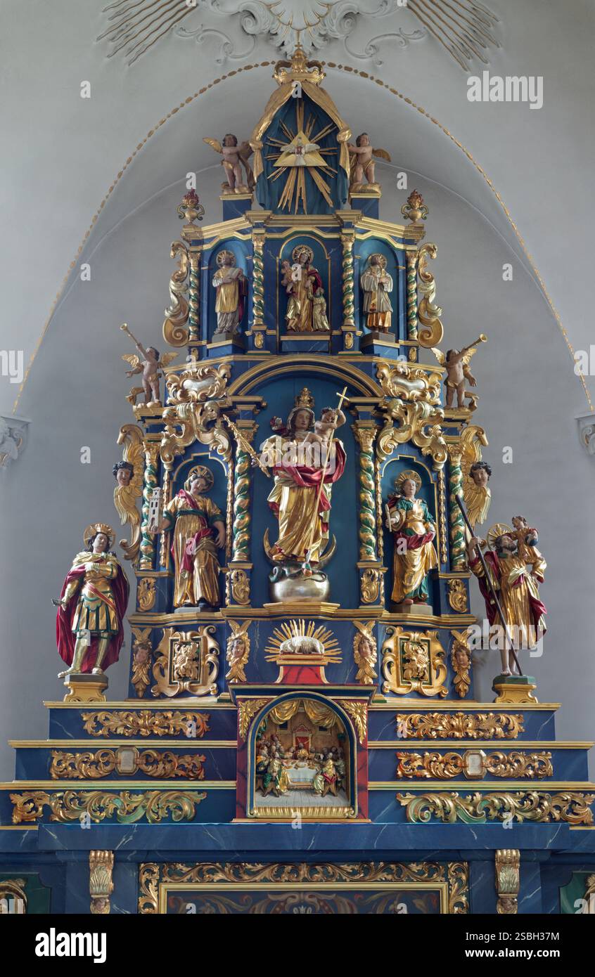 TASCH, SWITZERLAND - JULY 2, 2022: The baroque altar of Pharish church ...