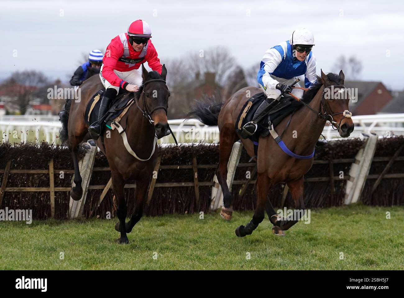 Vroomoz Eile ridden by jockey Charlotte Jones (right) on their way to ...