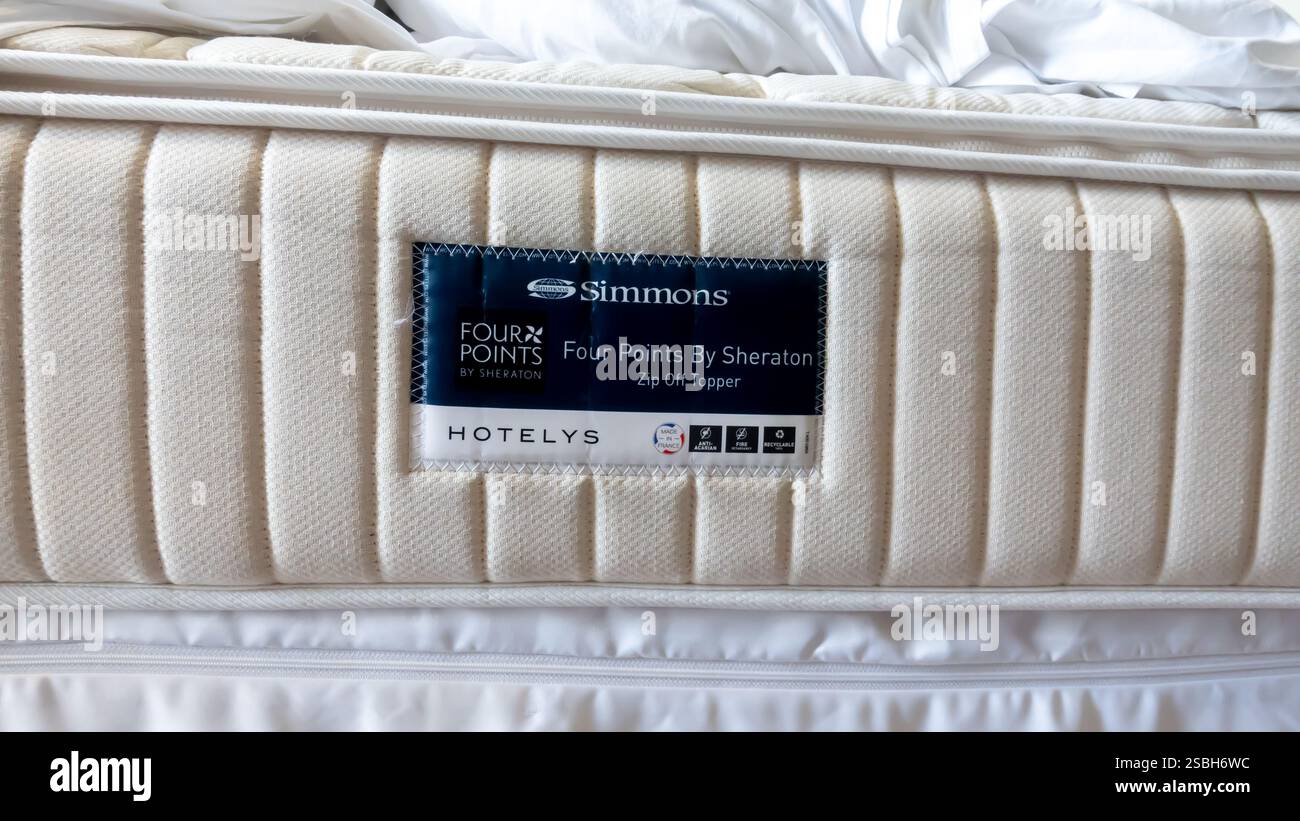 Simmons hotel mattress zip off topper label sign Stock Photo - Alamy