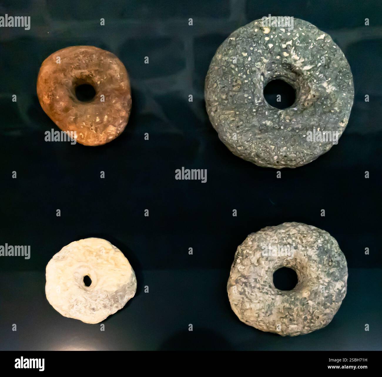 Weights - terra cotta (left), basalt (right), mid 5th millenium BC ...