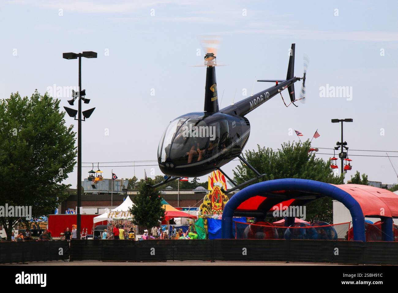 Columbus, Ohio, USA - 5 August 2023: A tour helicopter hovers above a ...