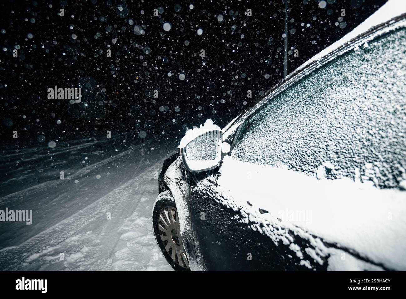 Car windshield heavily covered snow hi-res stock photography and images ...