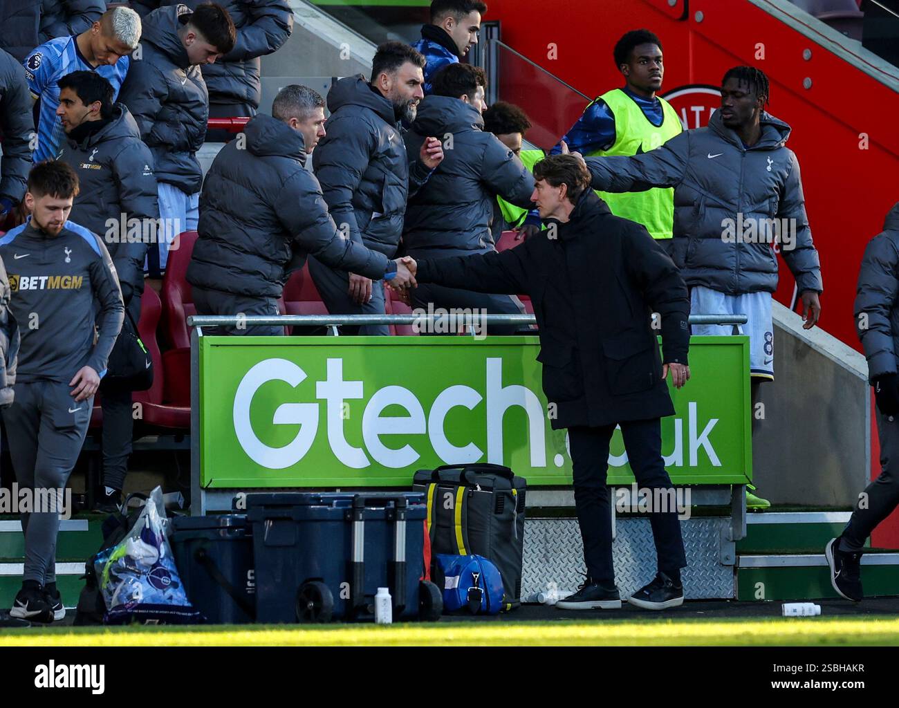 Brentford manager Thomas Frank shakes hands with Tottenham Hotspur ...
