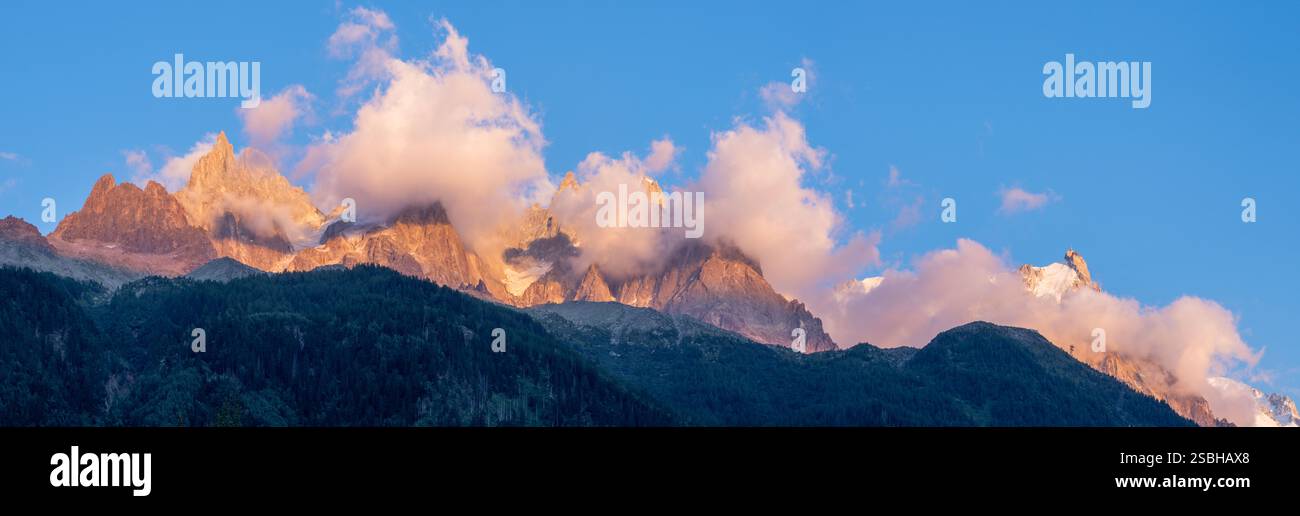 The panorama of Les Aiguilles towers in sunset light - Grands Charmoz ...