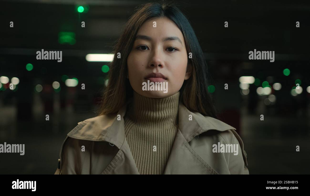 Close up portrait Asian woman looking at camera unhappy sight sad ...