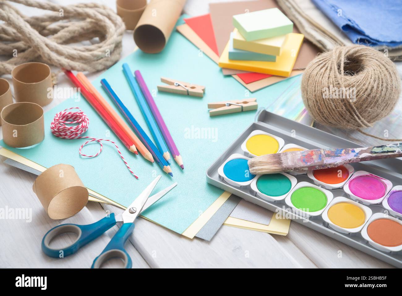 Craft materials - Designing with a paint box, pens, paper and cord ...