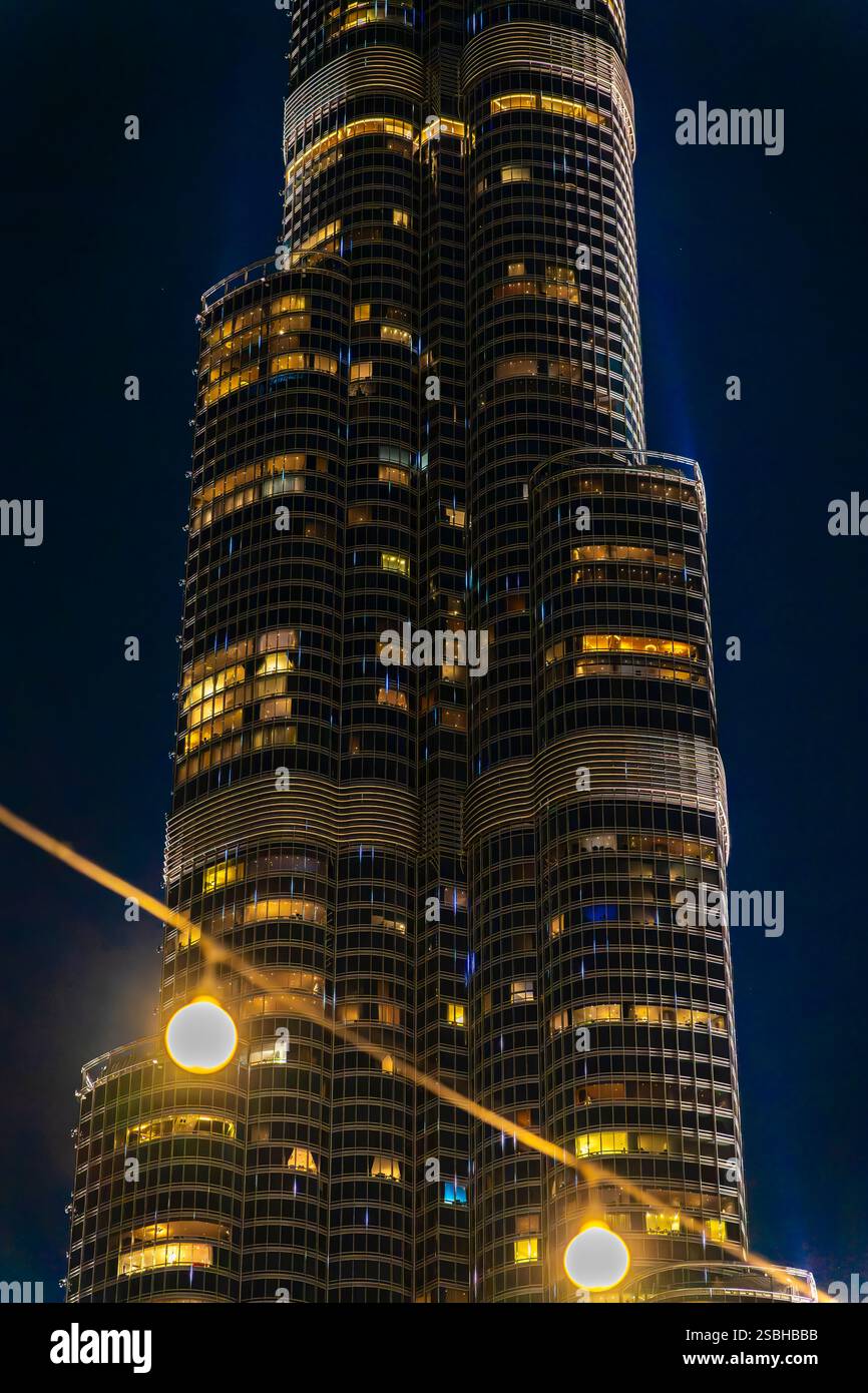 Bright lights of the Burj Khalifa in Dubai. Spectacularly illuminated ...