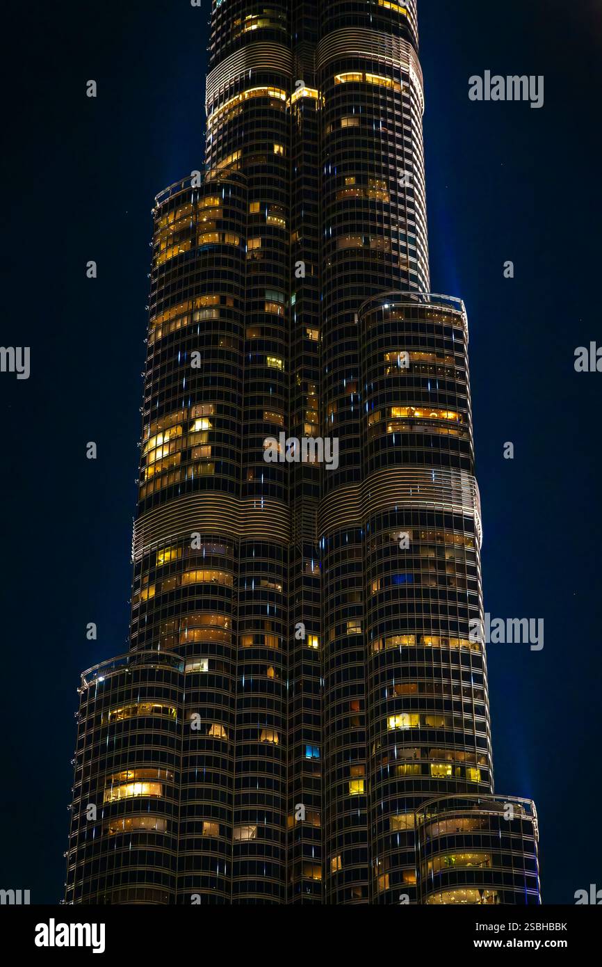 Bright lights of the Burj Khalifa in Dubai. Spectacularly illuminated ...