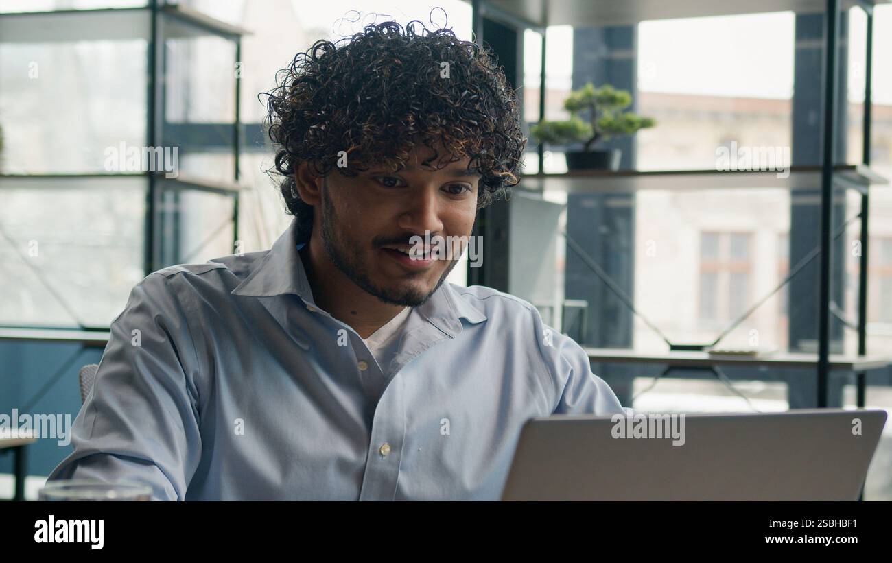 Excited shocked Arabian Indian businessman employer office worker happy ...