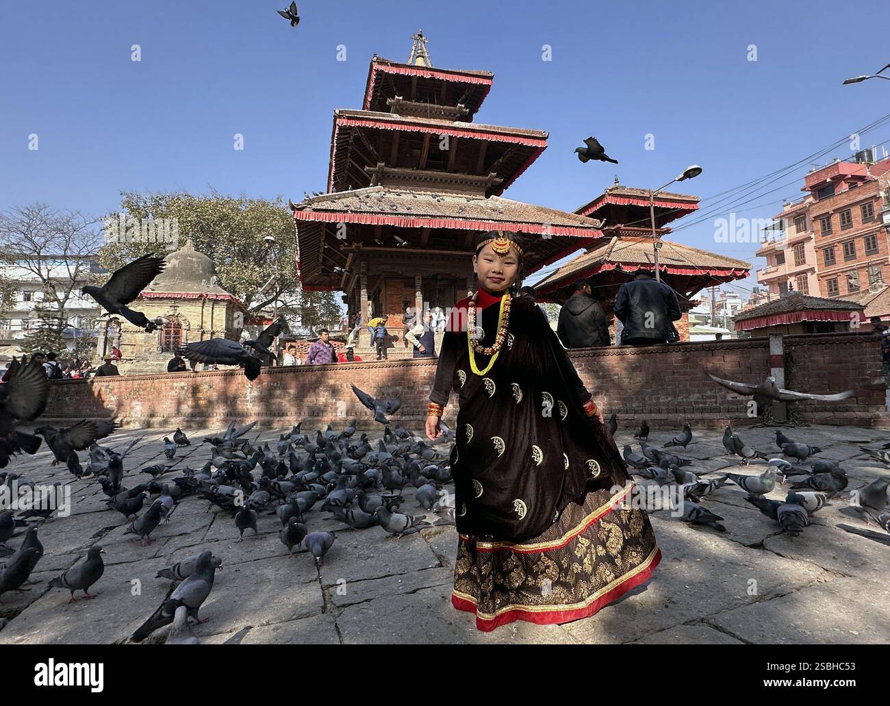 February 3, 2025: A small girl in traditional attire arrives to celebrate the Shree Panchami or ...