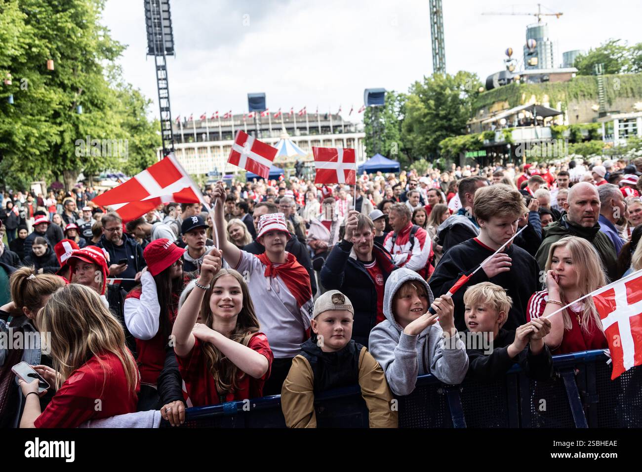 Danish fans wave flags in Tivoli. DBU, TV2 and Tivoli send the Danish ...