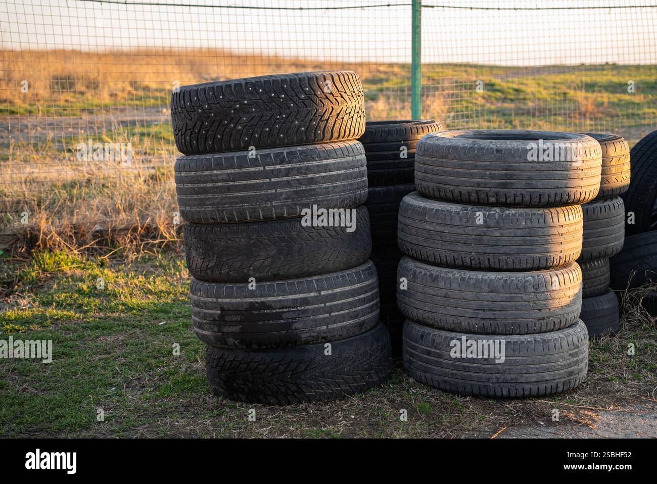 rubber recycling car tire old wheels waste stack Stock Photo - Alamy