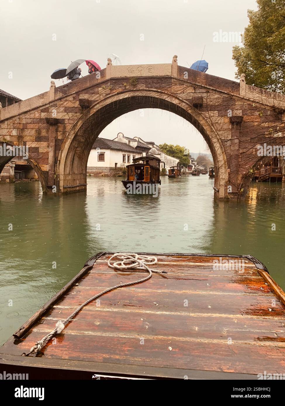 boat under bridge in china Stock Photo - Alamy