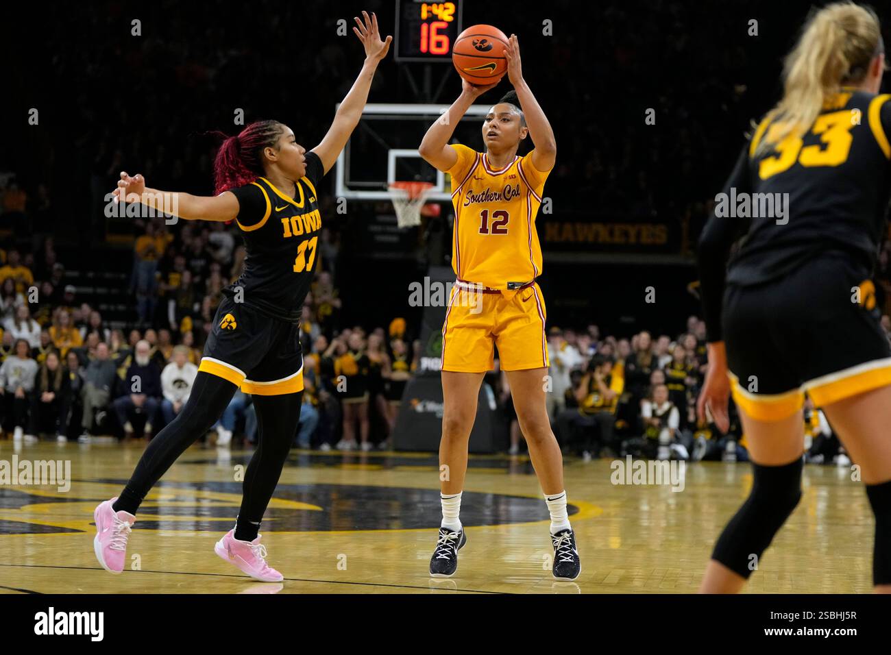 Southern California guard JuJu Watkins (12) shoots over Iowa guard ...