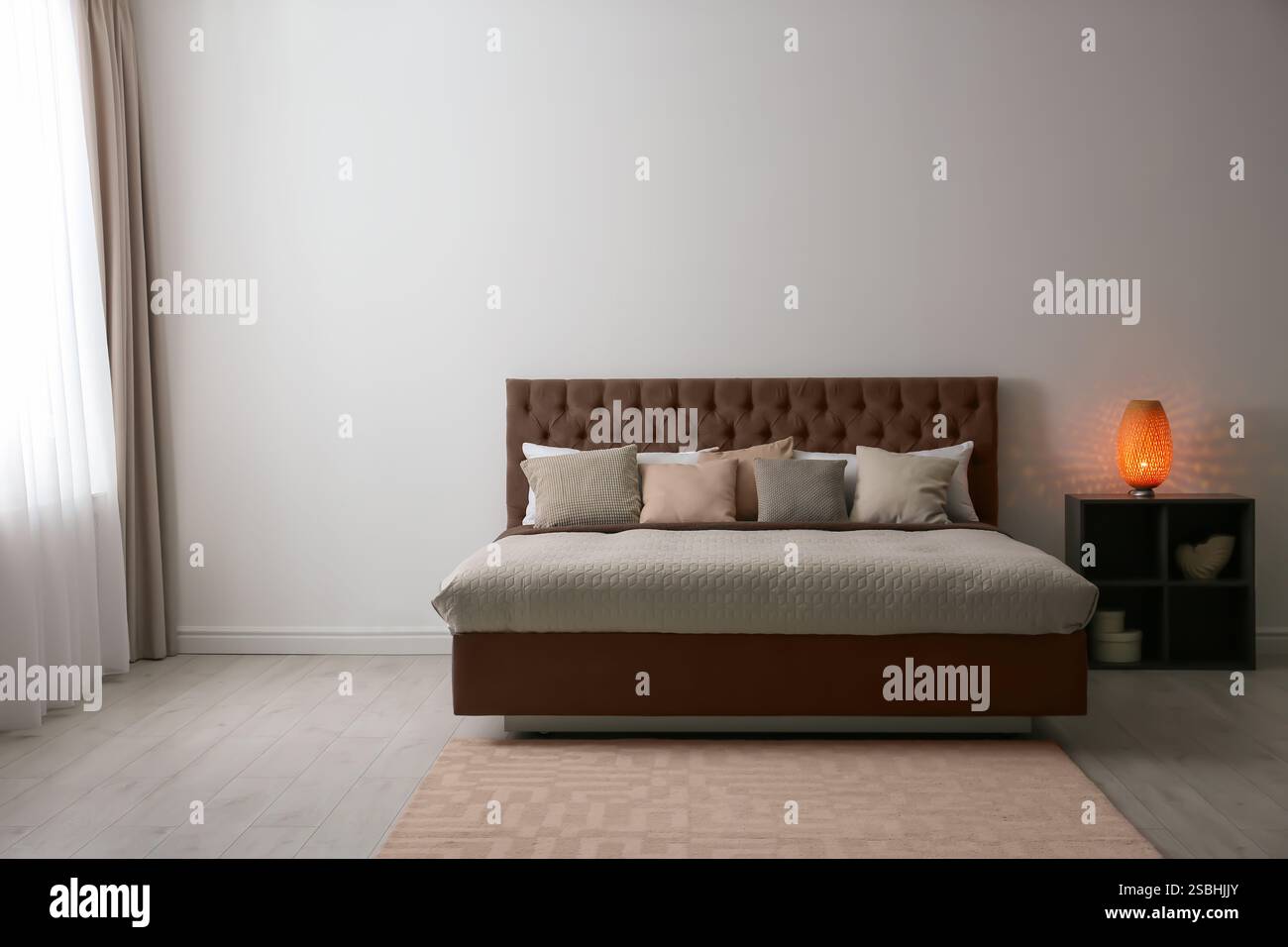 Cozy bedroom interior with mocha mousse shade. Trendy color of 2025 ...