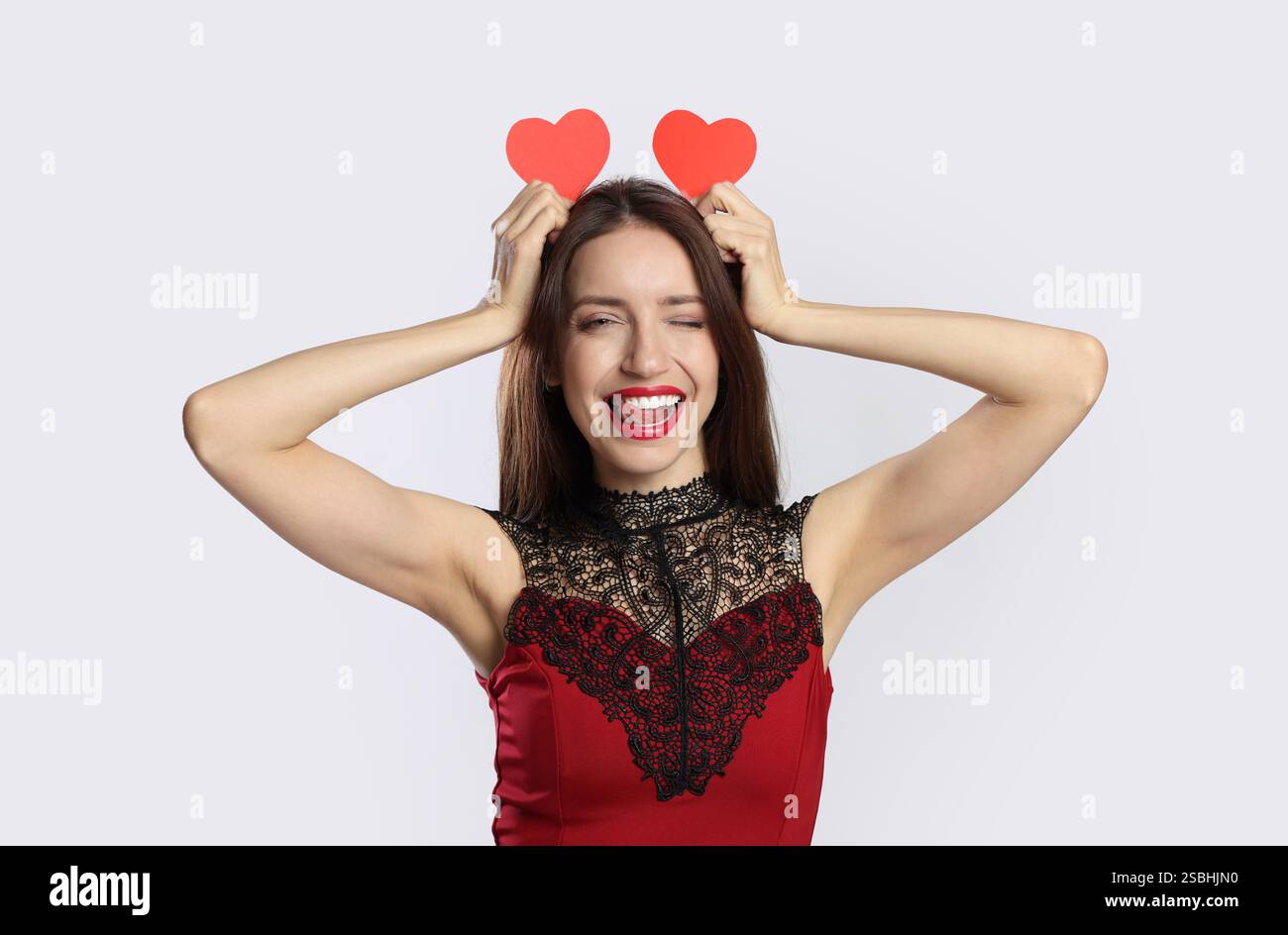 Happy Valentine's Day. Beautiful woman with paper hearts on white ...