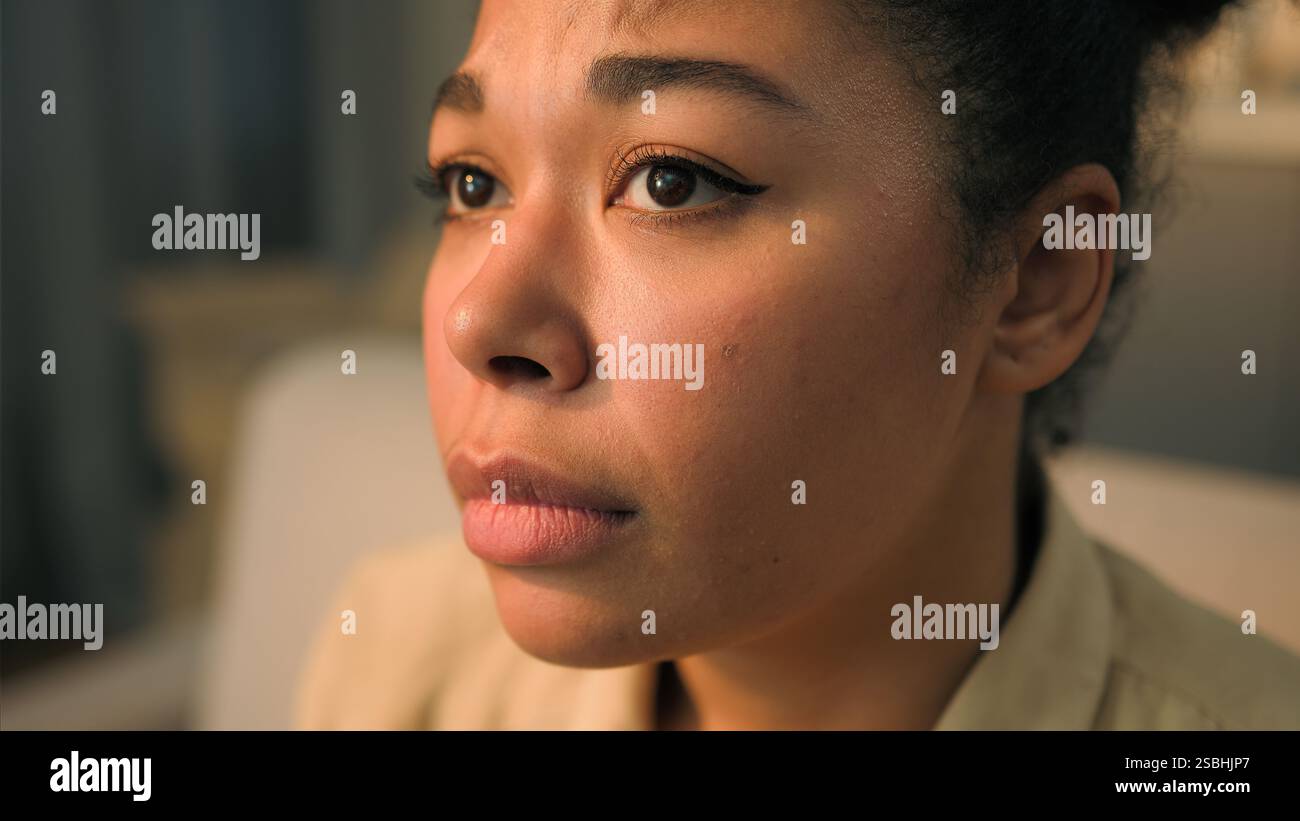 Close up face African American woman disappointed upset alone sorrowful ...