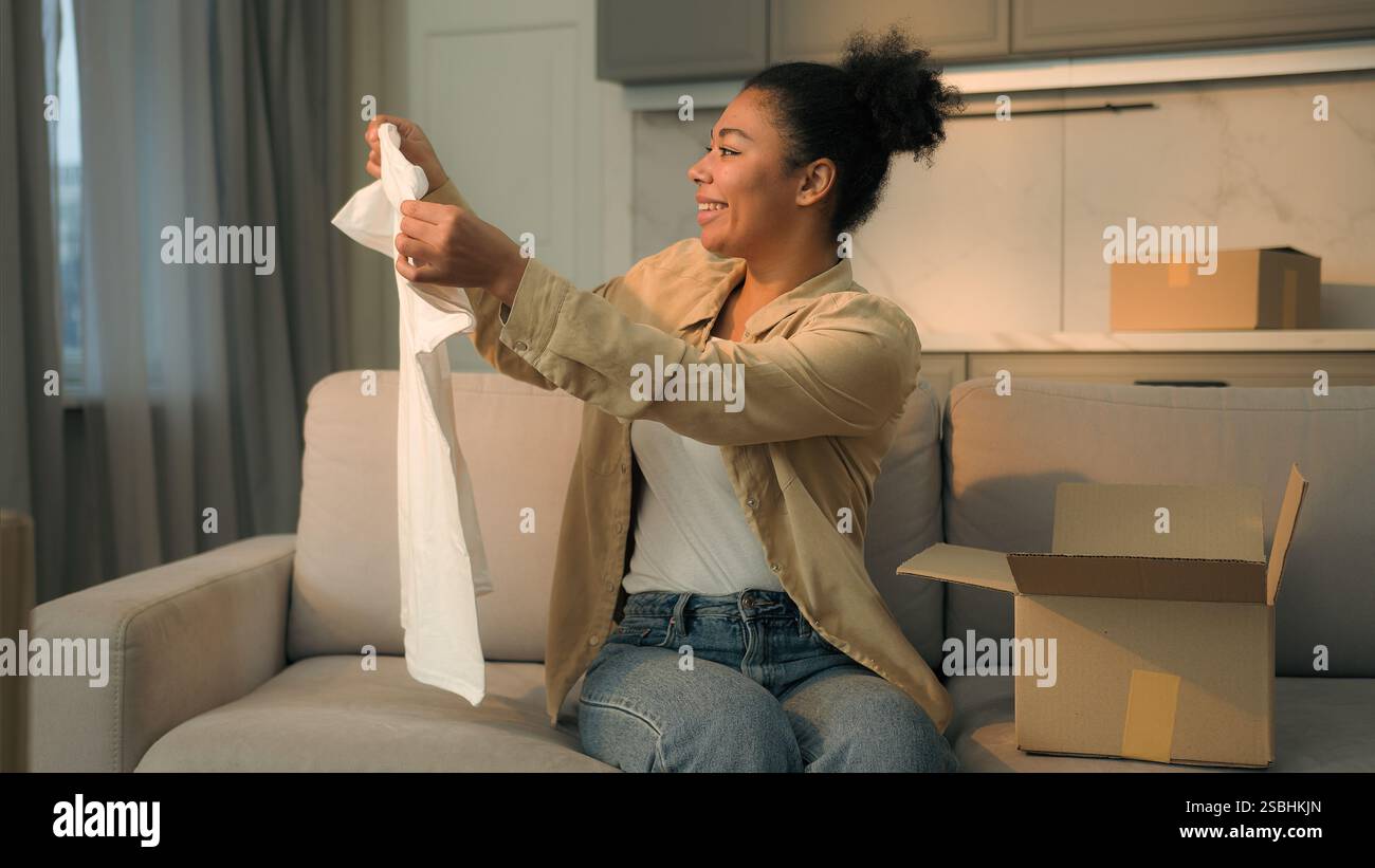 Happy cheerful girl customer female African American woman home owner ...