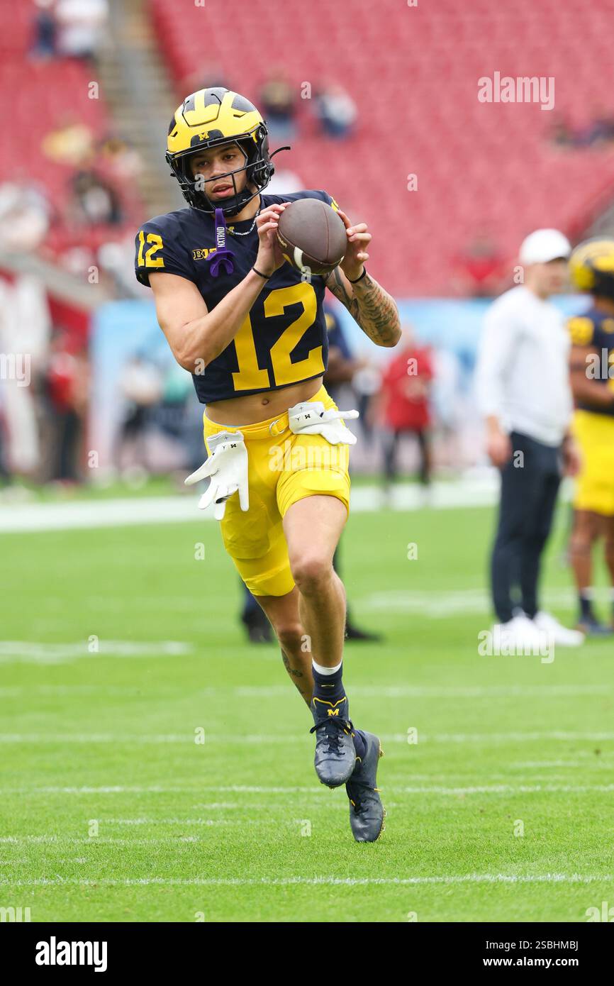 Michigan Wolverines wide receiver Kendrick Bell (12) carries the ball ...