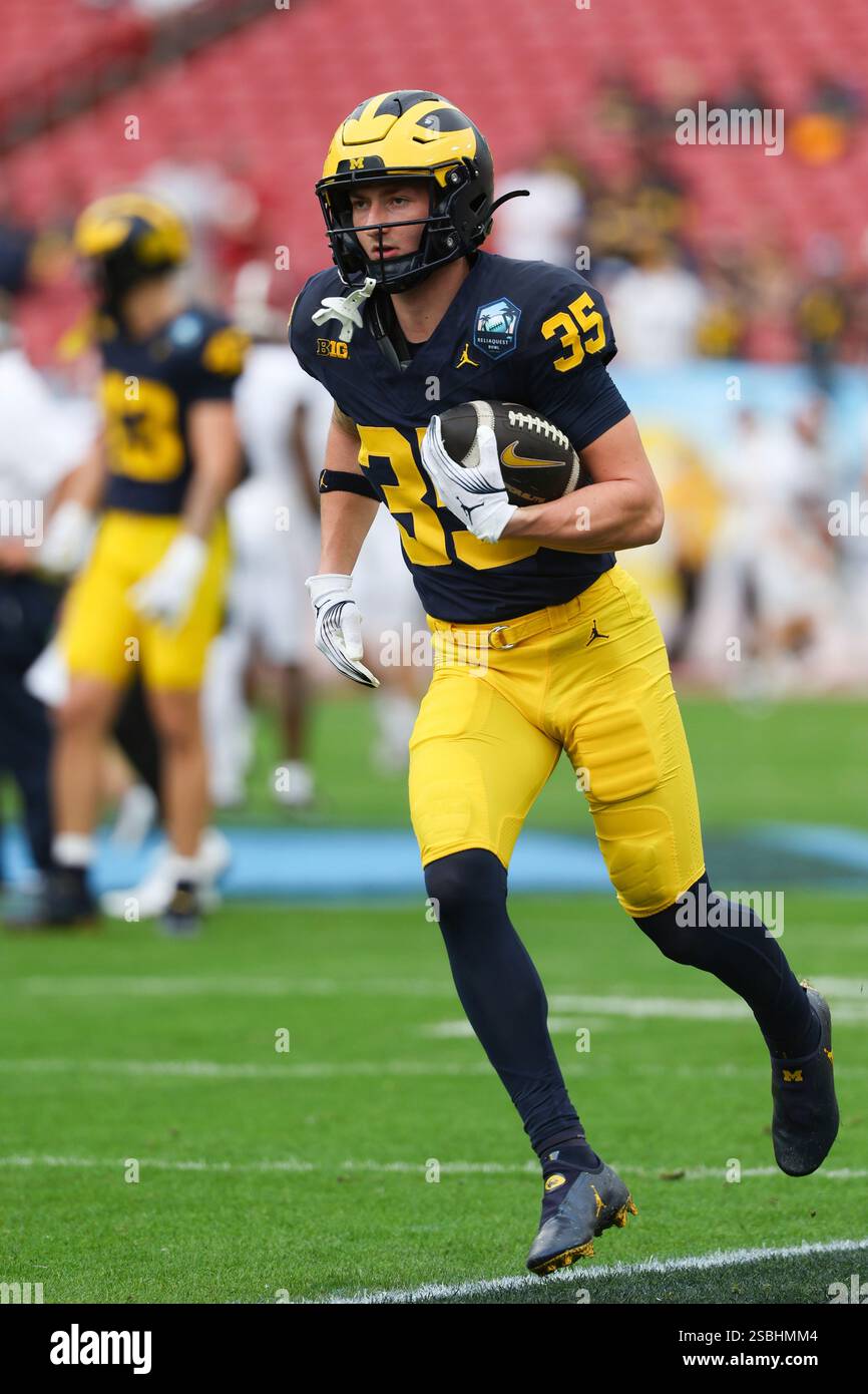 Michigan Wolverines wide receiver Logan Forbes (35) carries the ball ...