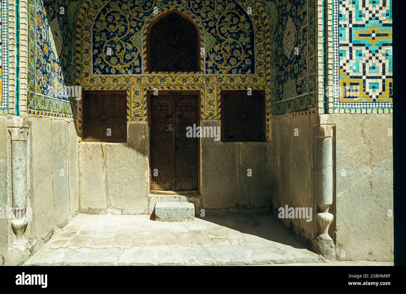 This image with colourful tile work is of the internal courtyard and ...