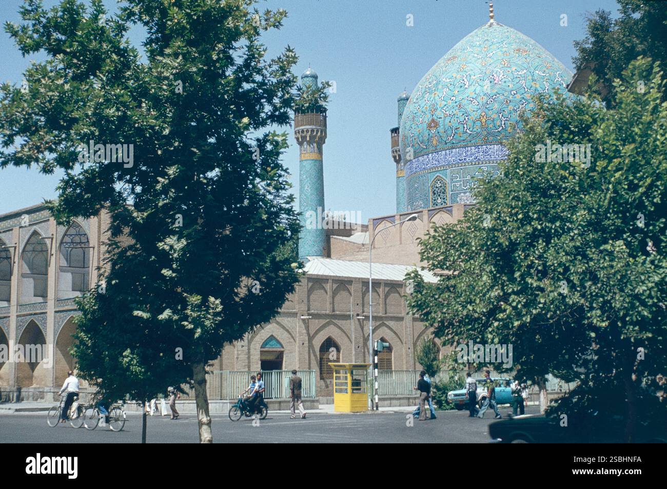 The image is of the Islamic dome and minaret of the Madrese Madar-I ...