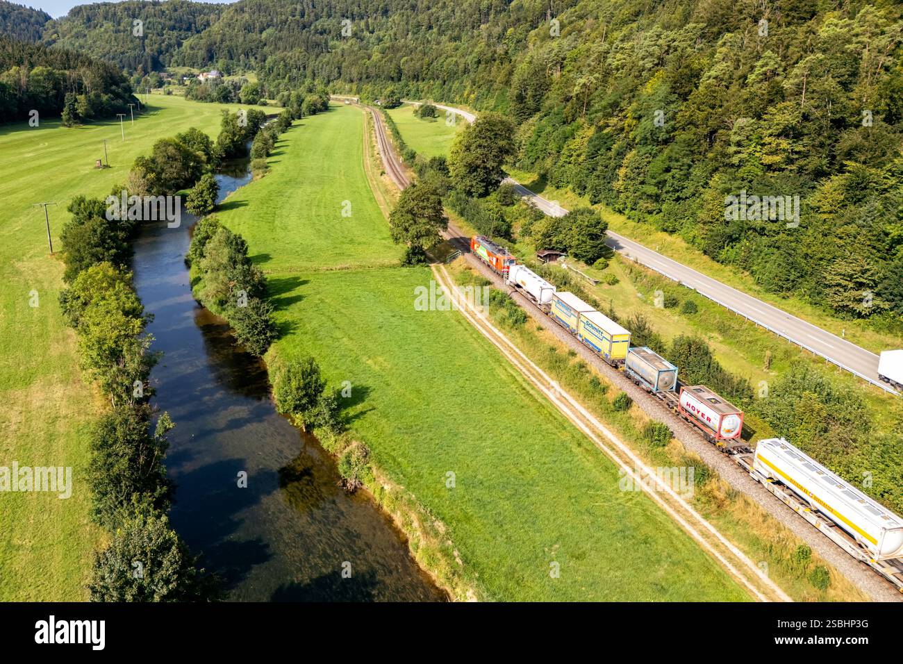 Sulz, Germany - August 23, 2024: Aerial view of freight train of Deutsche Bahn DB Cargo on ...
