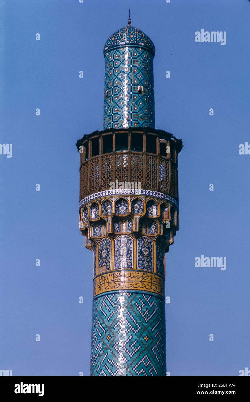 The image is of the Islamic dome and minaret of the Madrese Madar-I ...