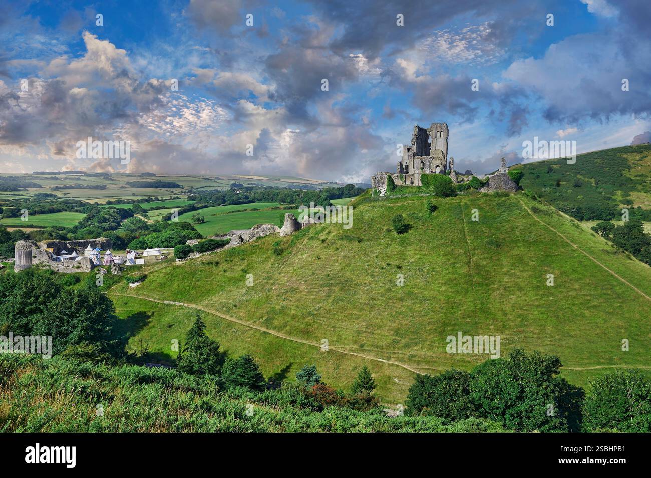 Medieval Corfe castle keep & battlements at sunrise, built in 1086 by ...