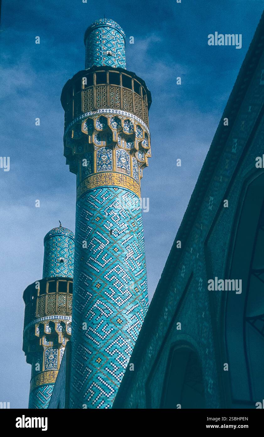 The image is of the Islamic minaret tower of the Madrese Madar-I-Shah ...