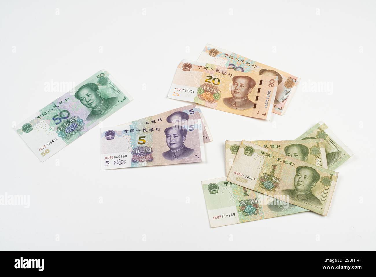 Some chinese Renminbi banknotes on a white surface Stock Photo - Alamy