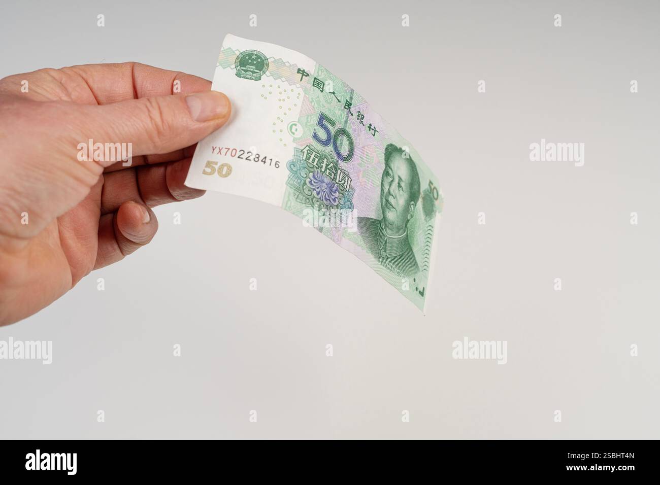 Cash paper yuan banknotes business hi-res stock photography and images ...