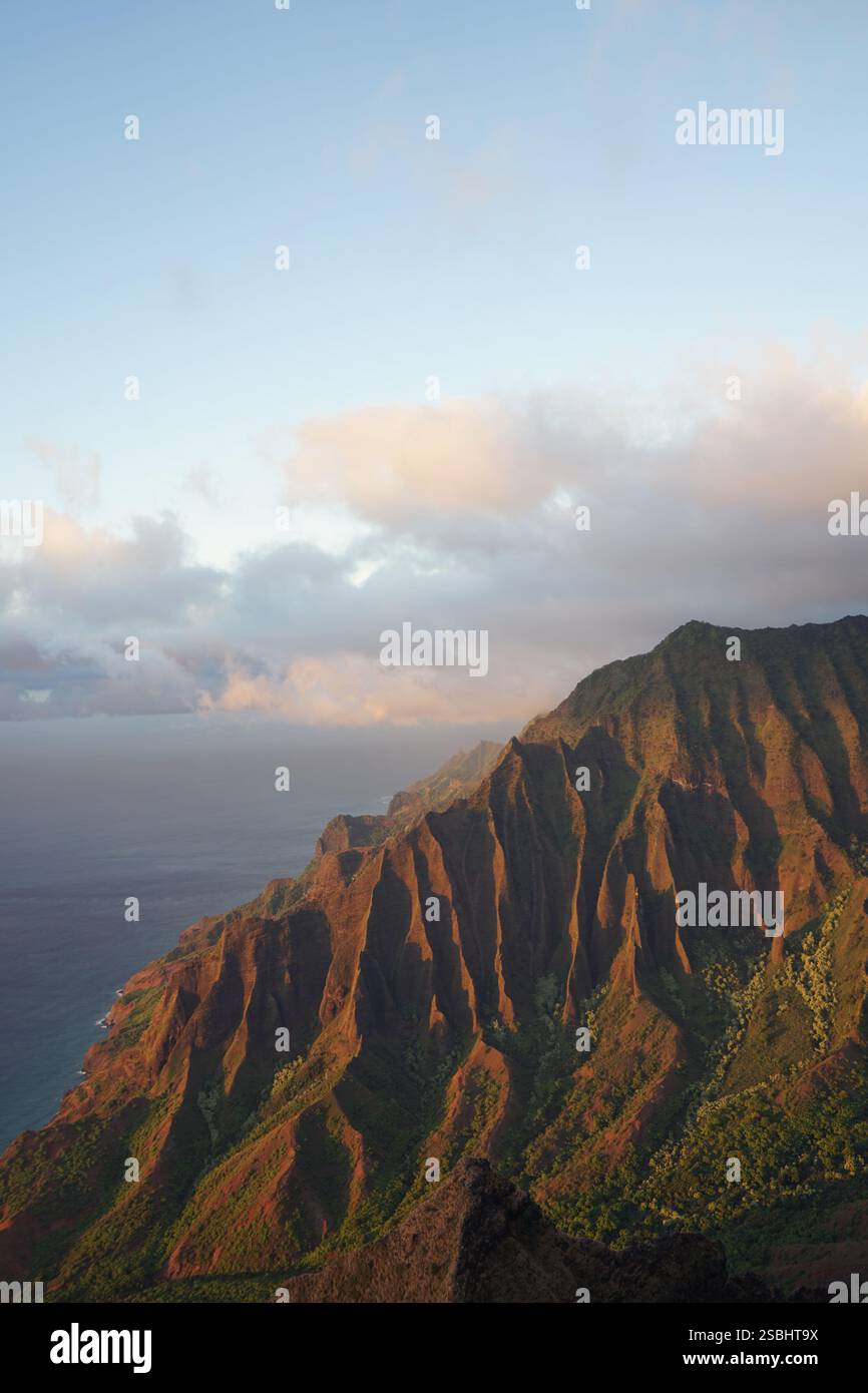 Golden light over the Na Pali Coast, Kauai, highlighting its dramatic ...