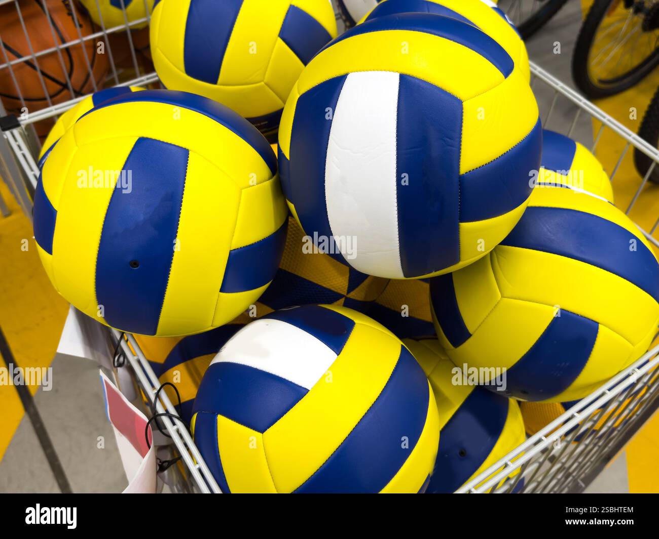 Brightly colored volleyballs in vibrant blue, yellow, and red are ...