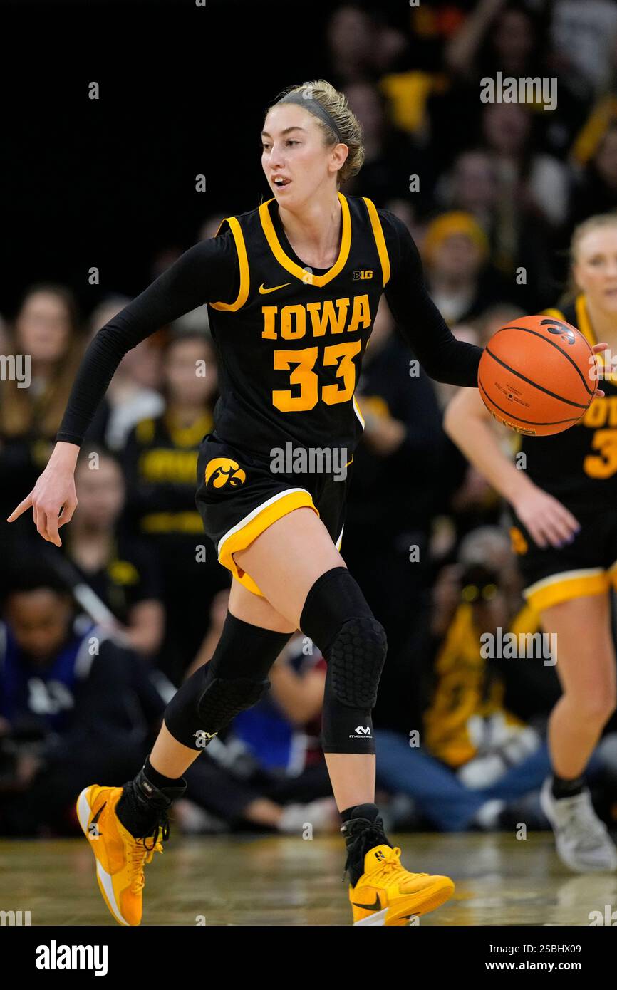Iowa guard Lucy Olsen drives up court during the second half of an NCAA ...