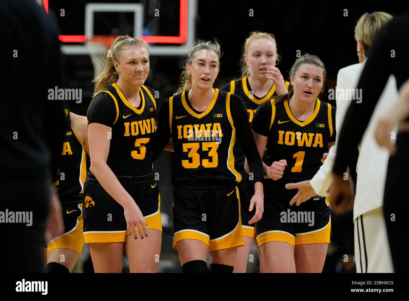 Iowa guard Lucy Olsen (33) celebrates with teammates during the second ...