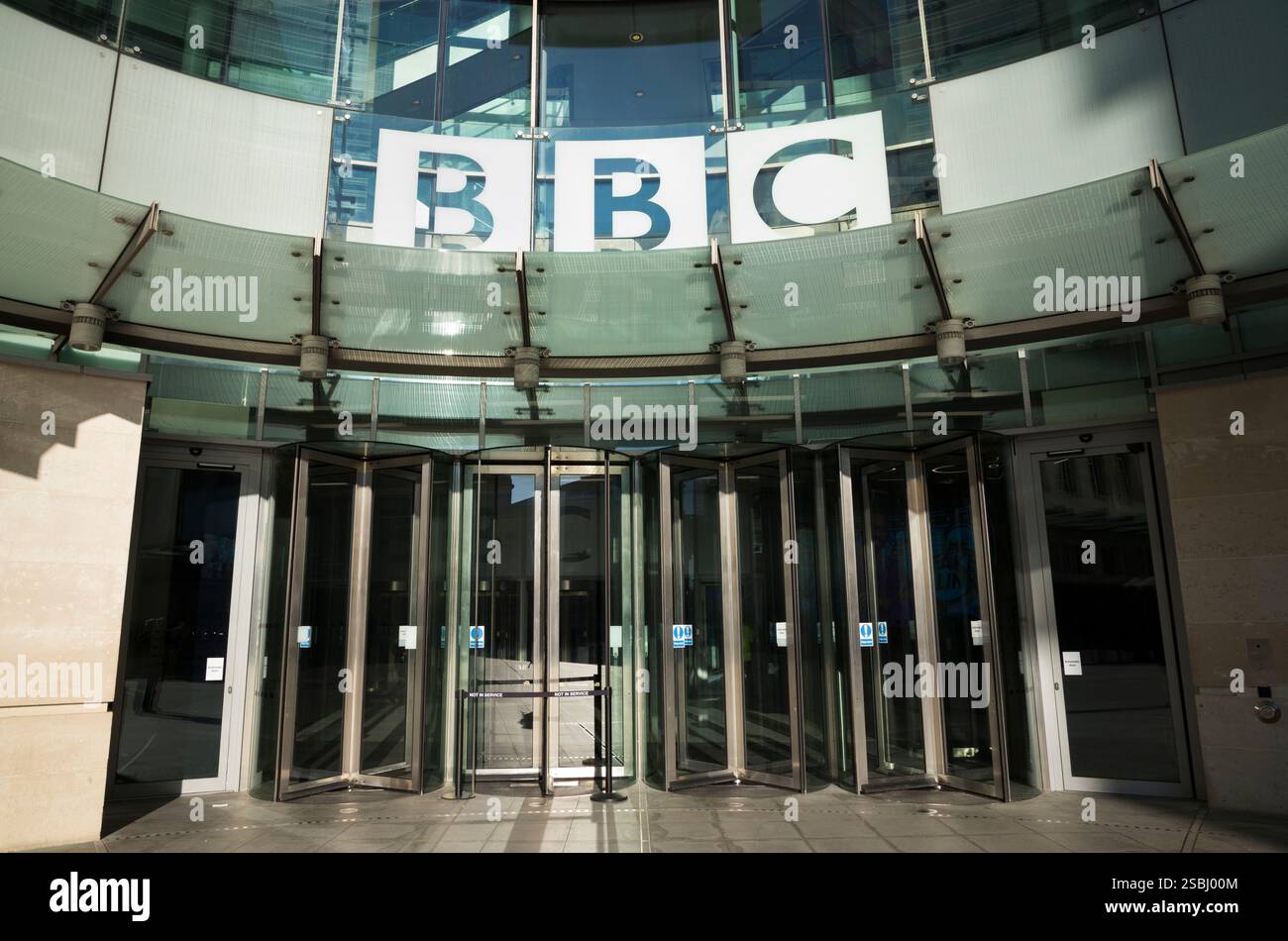BBC logo letters on glass screen above the entrance door / doors of the ...