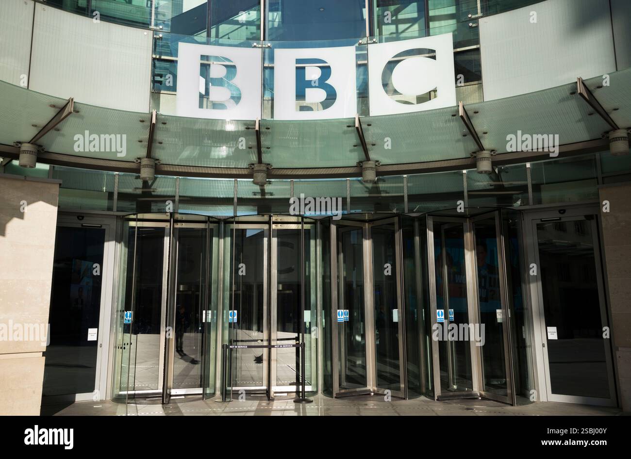 BBC logo letters on glass screen above the entrance door / doors of the ...